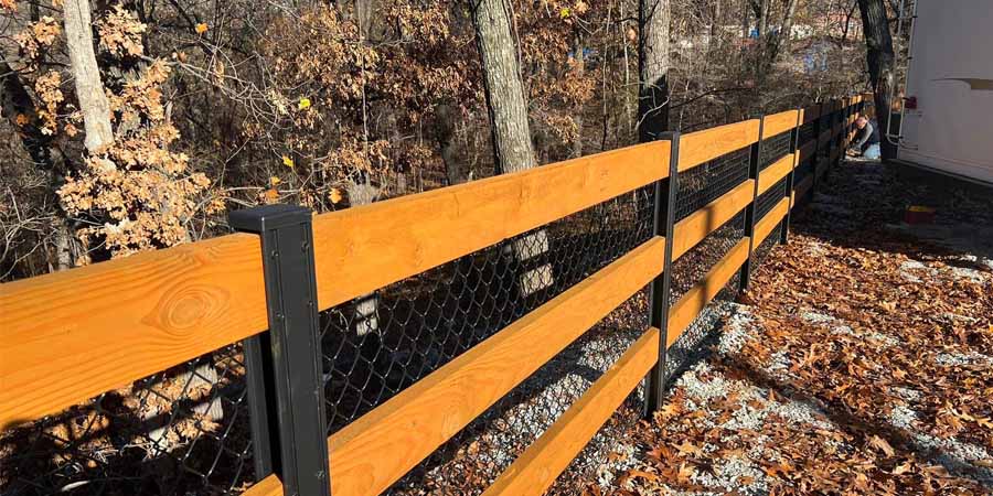 Enhancing Your Ranch with a Modern Black Chain Link Ranch Rail Fence Design